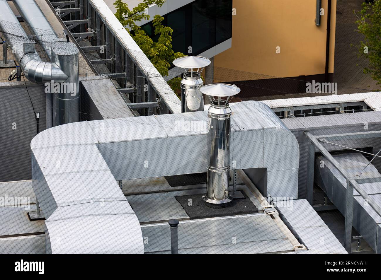 Ducts of the ventilation and air conditioning system on the roof of the ...