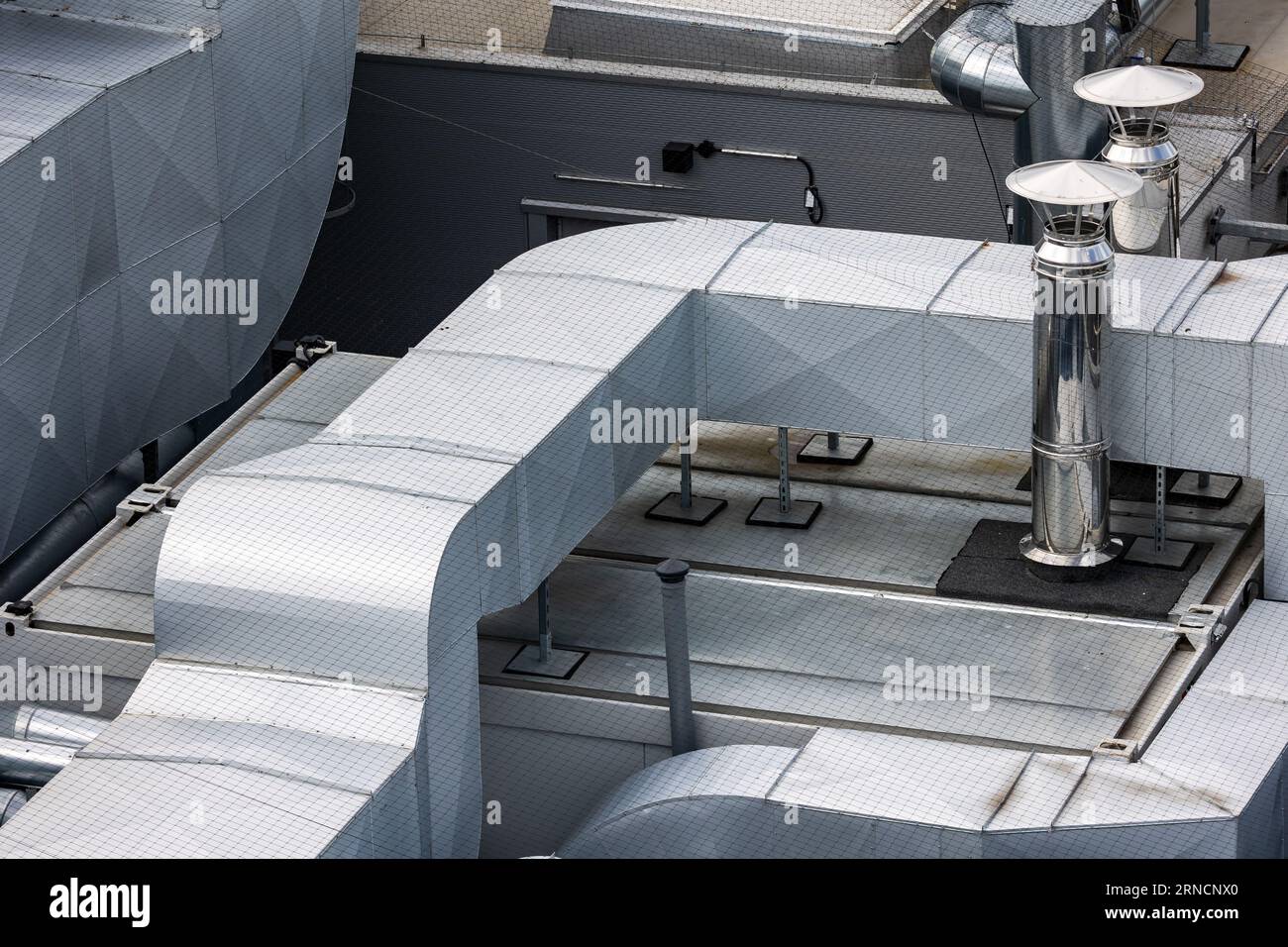 Ducts of the ventilation and air conditioning system on the roof of the ...