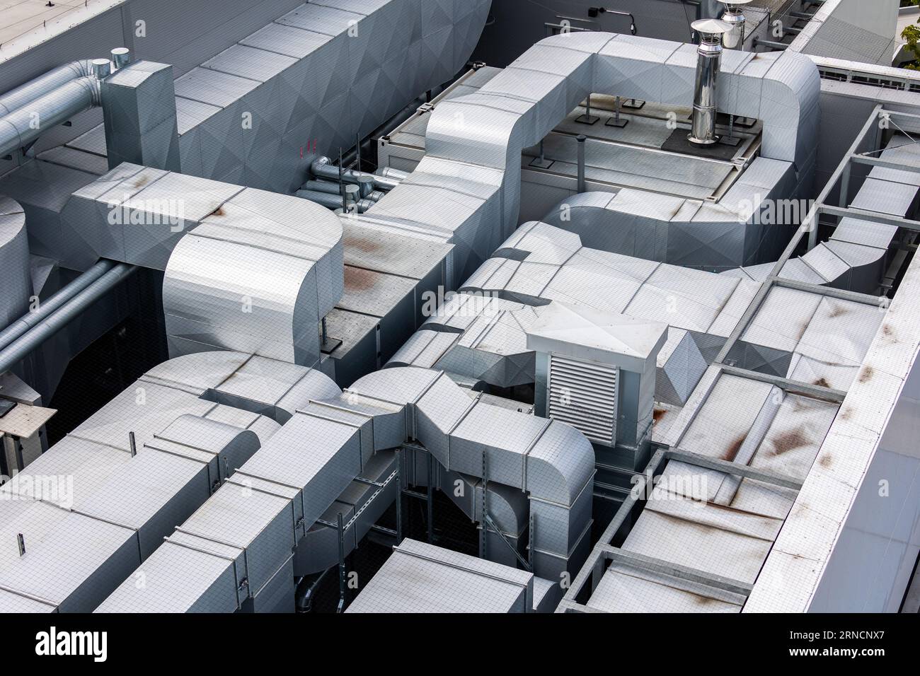 Ducts of the ventilation and air conditioning system on the roof of the ...