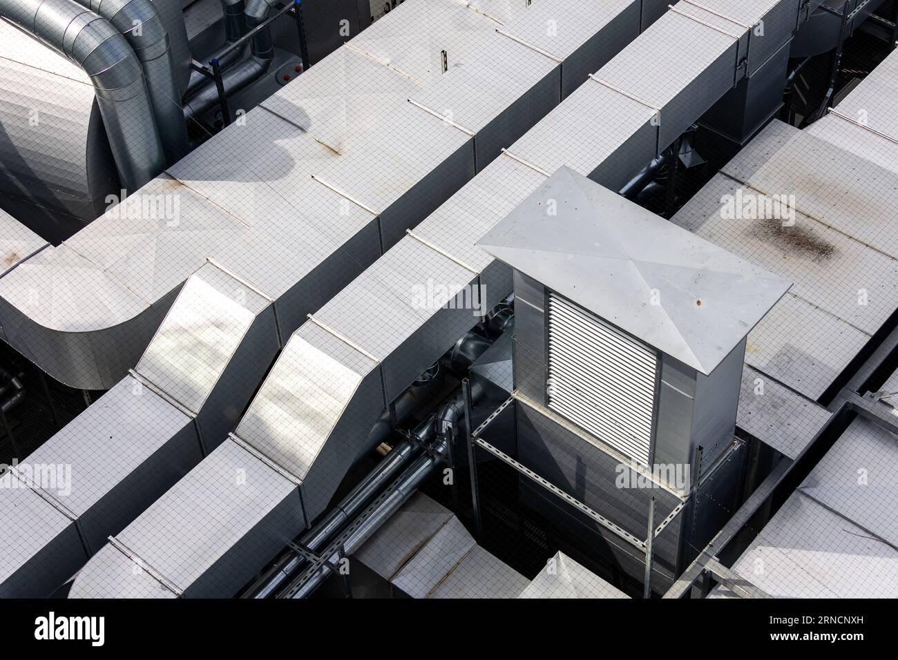 Ducts of the ventilation and air conditioning system on the roof of the ...