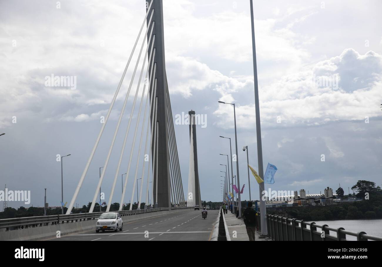 Photo taken on April 18, 2016 shows vehicles traveling on Kigamboni ...