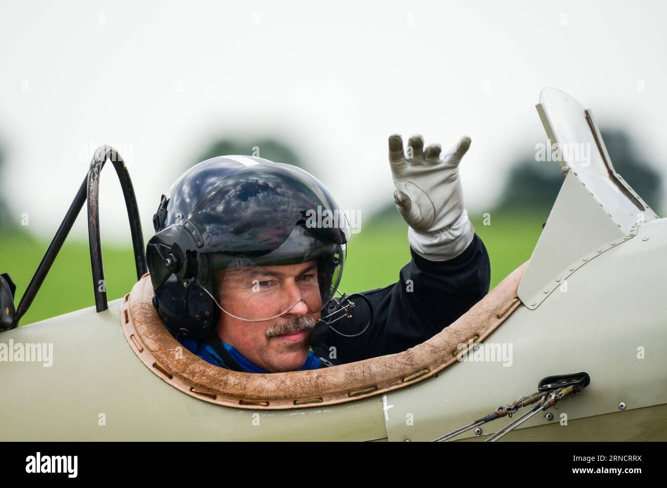 Dan Griffith, pilot, in cockpit, taxiing a First World War plane prior ...