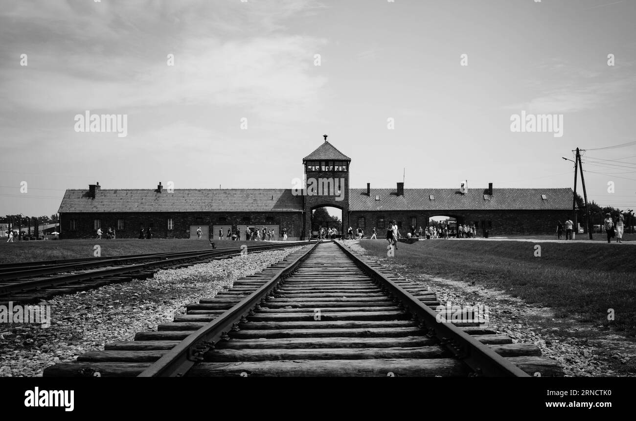 The entry gate to the Concentration Camp Auschwitz Birkenau Stock Photo ...