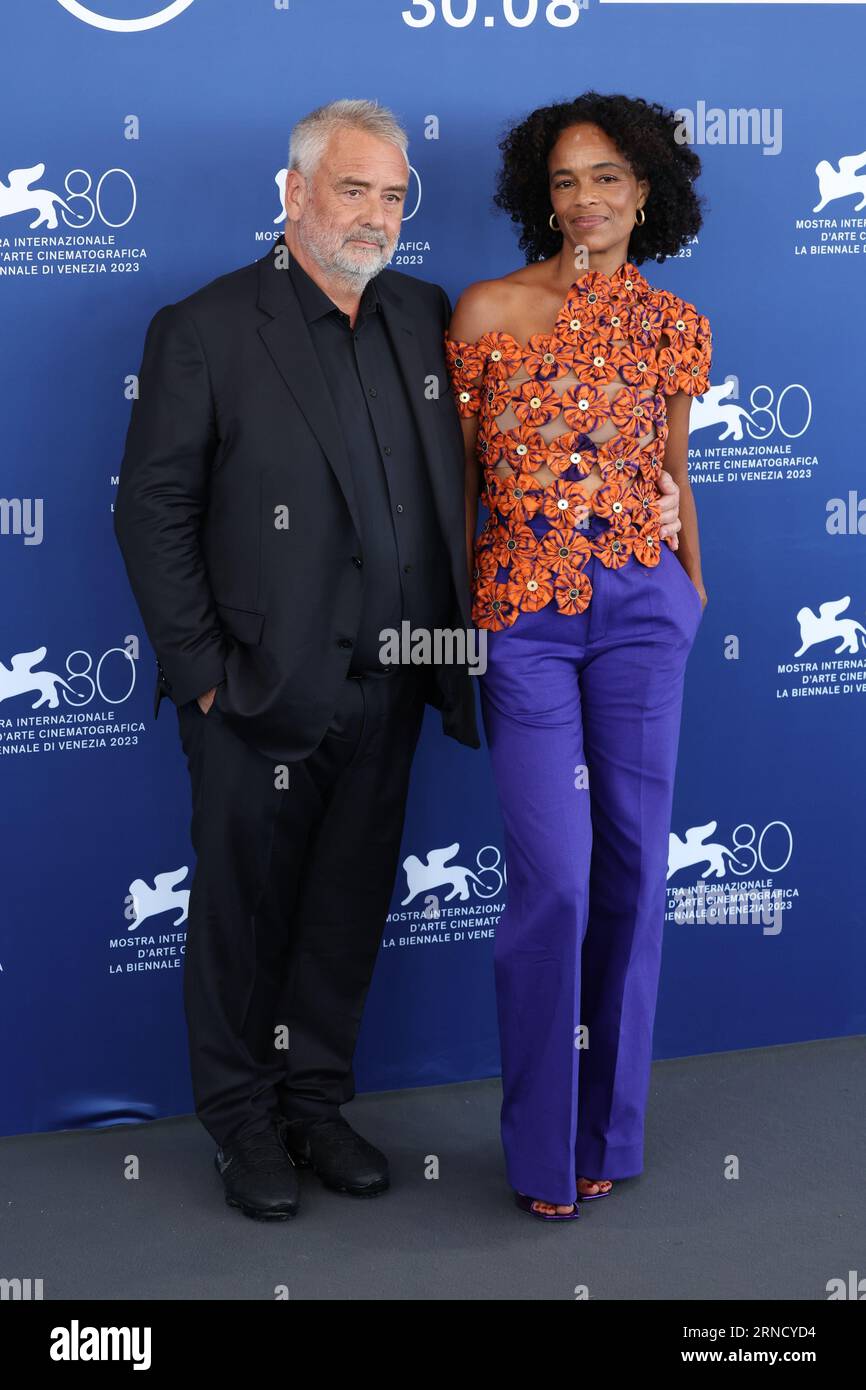 Luc Besson and Virginie Silla attend a photocall for the movie "Dogman ...