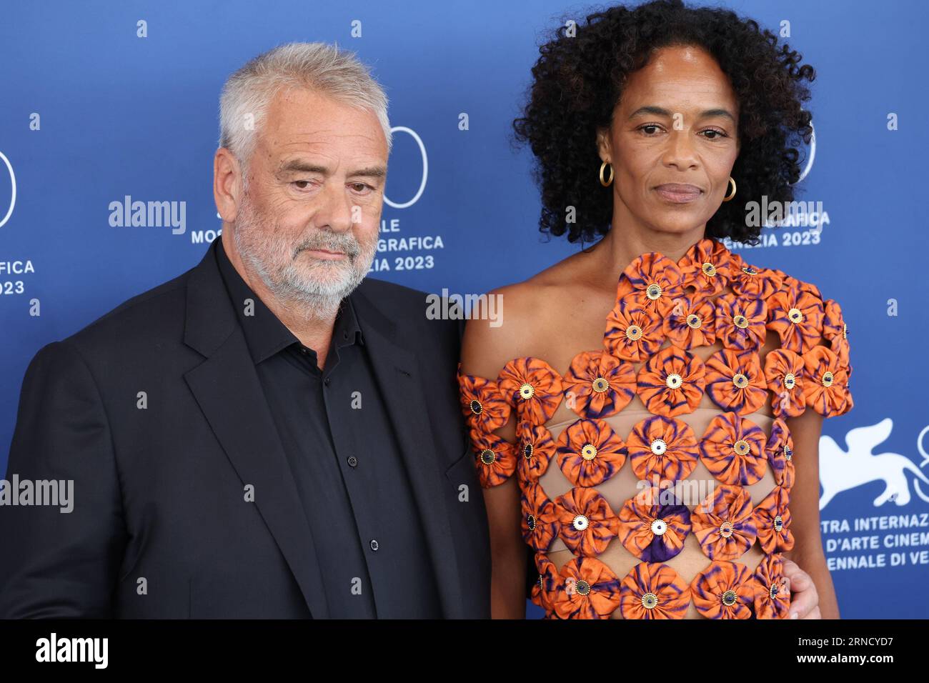 Luc Besson and Virginie Silla attend a photocall for the movie "Dogman ...
