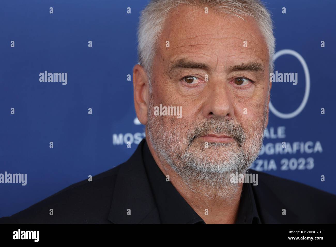 Luc Besson attends a photocall for the movie "Dogman" at the 80th ...