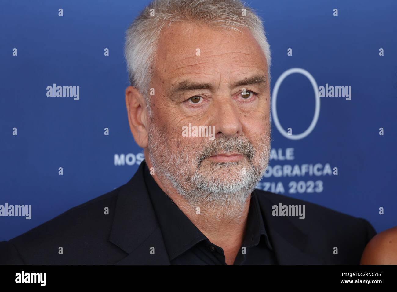Luc Besson attends a photocall for the movie "Dogman" at the 80th ...