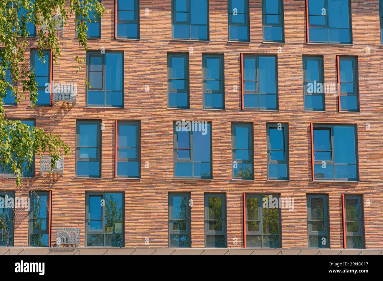 New building facade in housing complex. Modern style in architecture ...