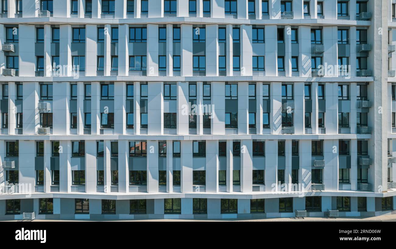 New building facade in housing complex. Modern style in architecture ...