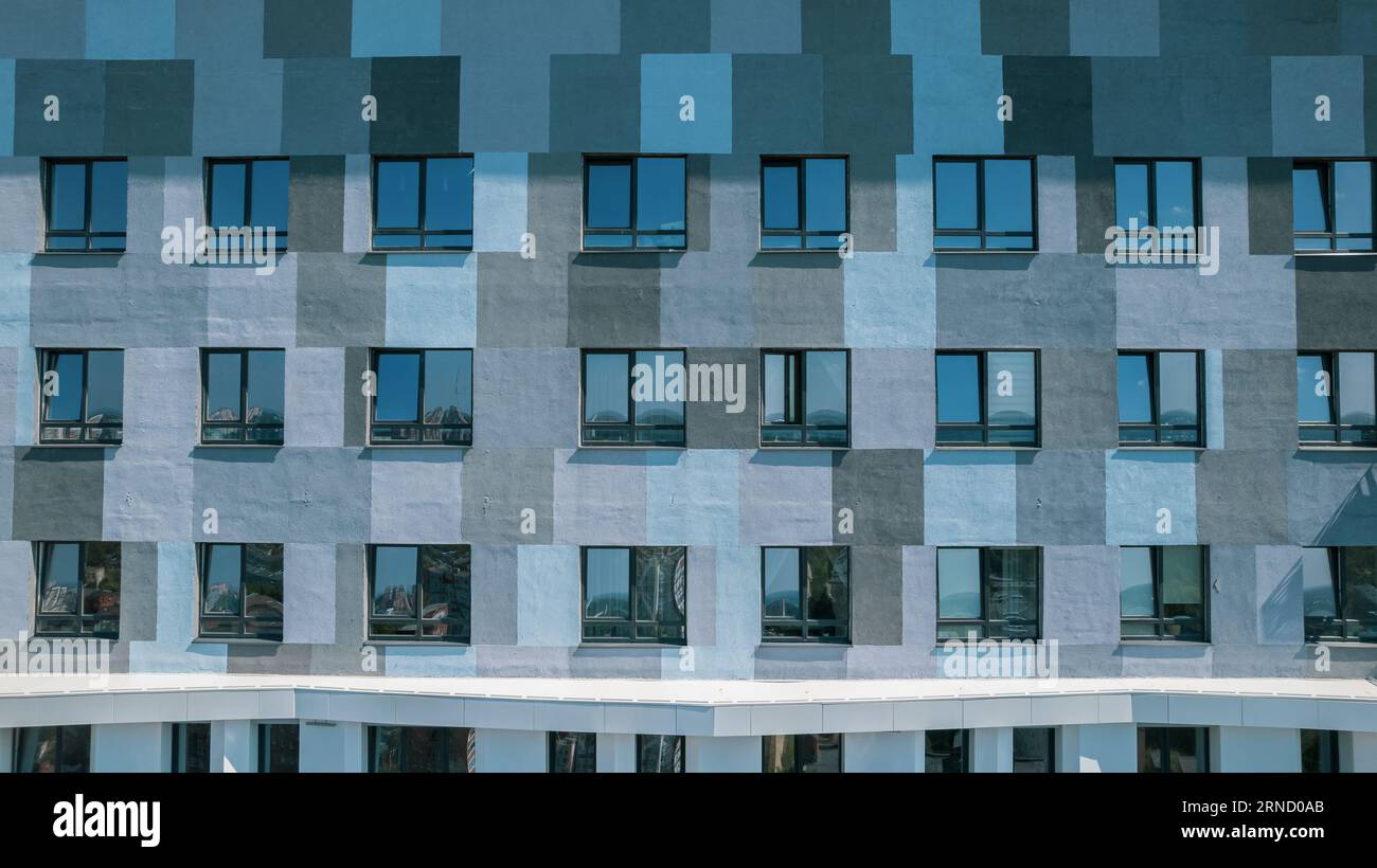 New building facade in housing complex. Modern style in architecture ...