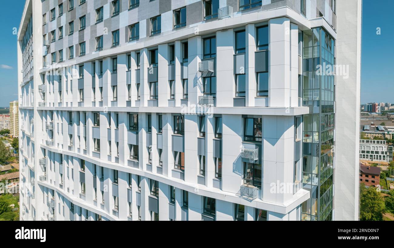 New building facade in housing complex. Modern style in architecture ...