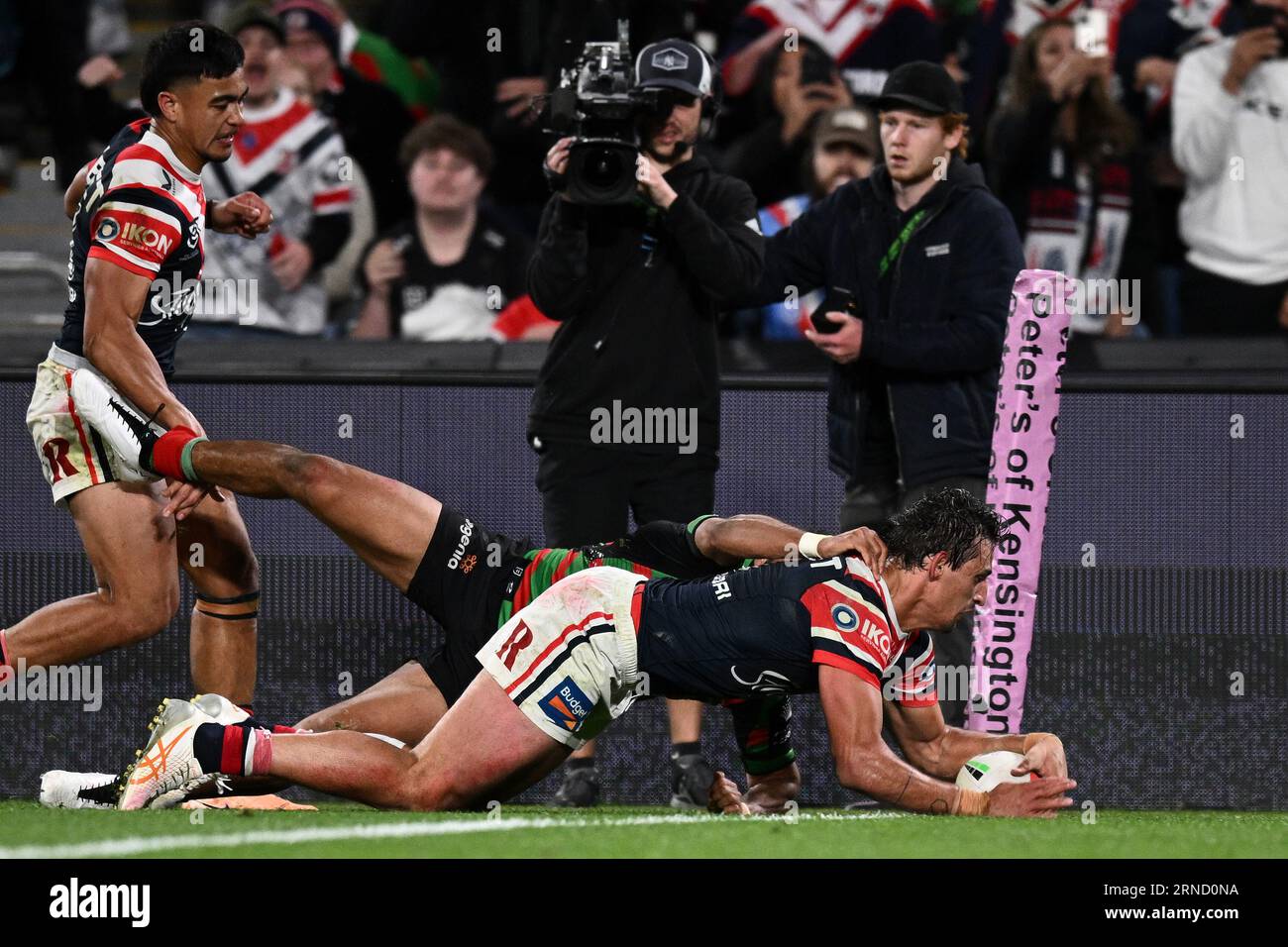 Sydney, Australia. 01st Sep, 2023. Billy Smith of the Roosters scores a ...