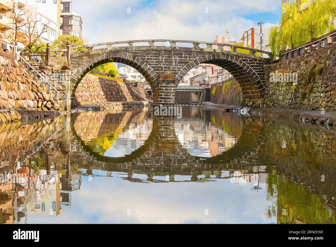 Nagasaki, Japan - Nov 29 2022: Meganebashi Bridge is the most remarkable of several stone ...