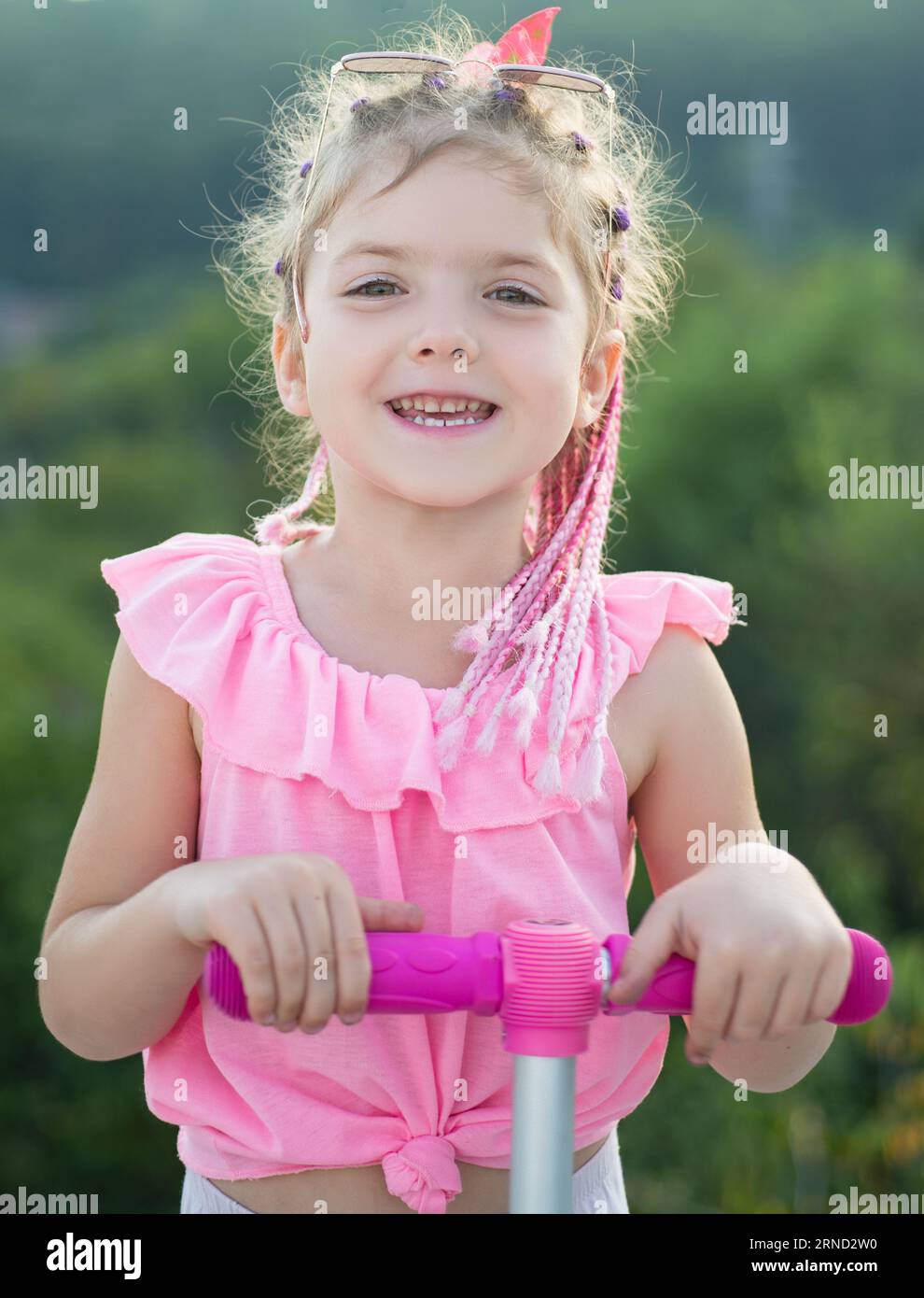 Cute little smiling happy girl close up face. Lifestyle closeup ...