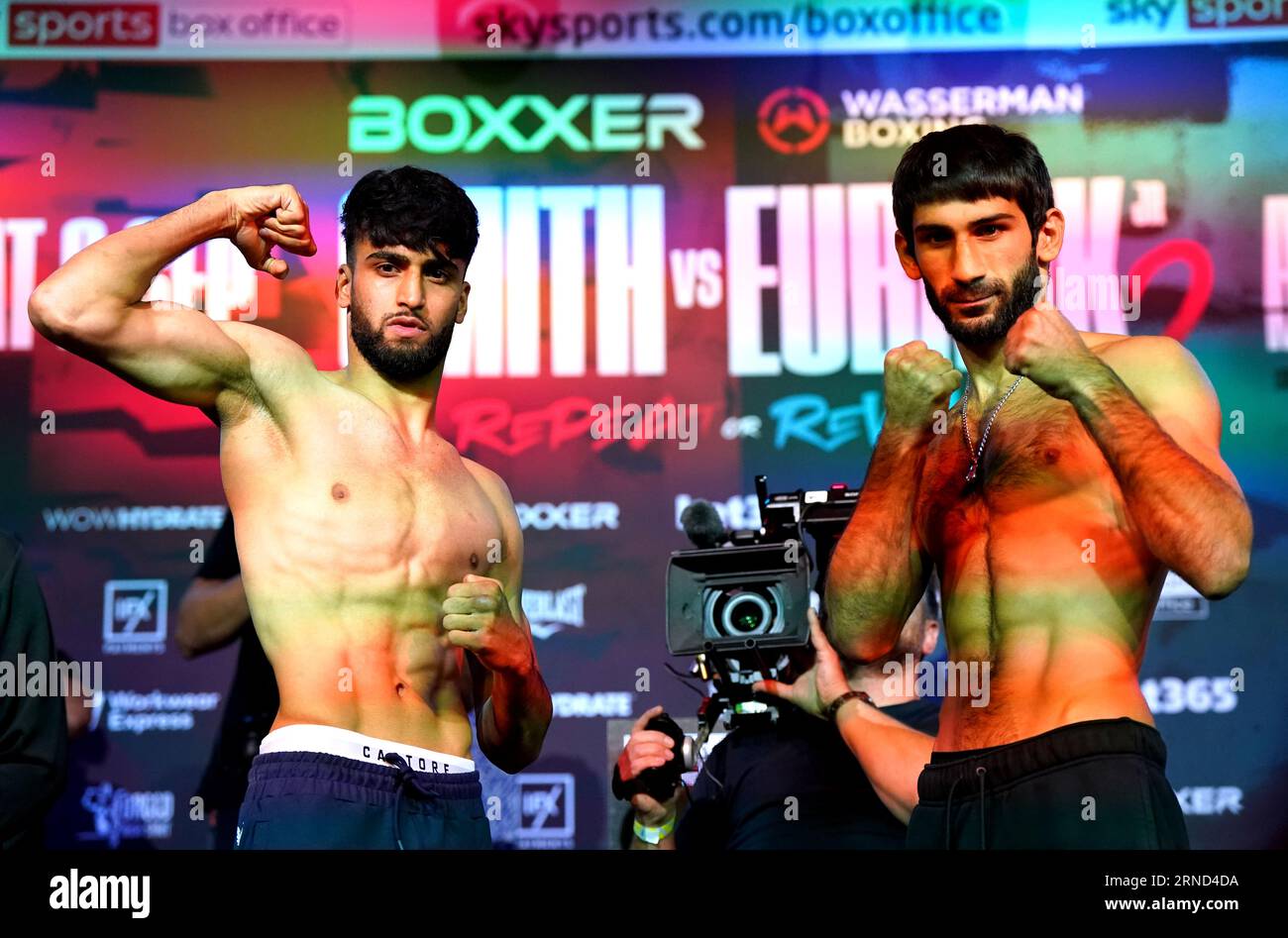 Adam Azim (left) and Aram Faniian during a weigh-in at New Century Hall ...