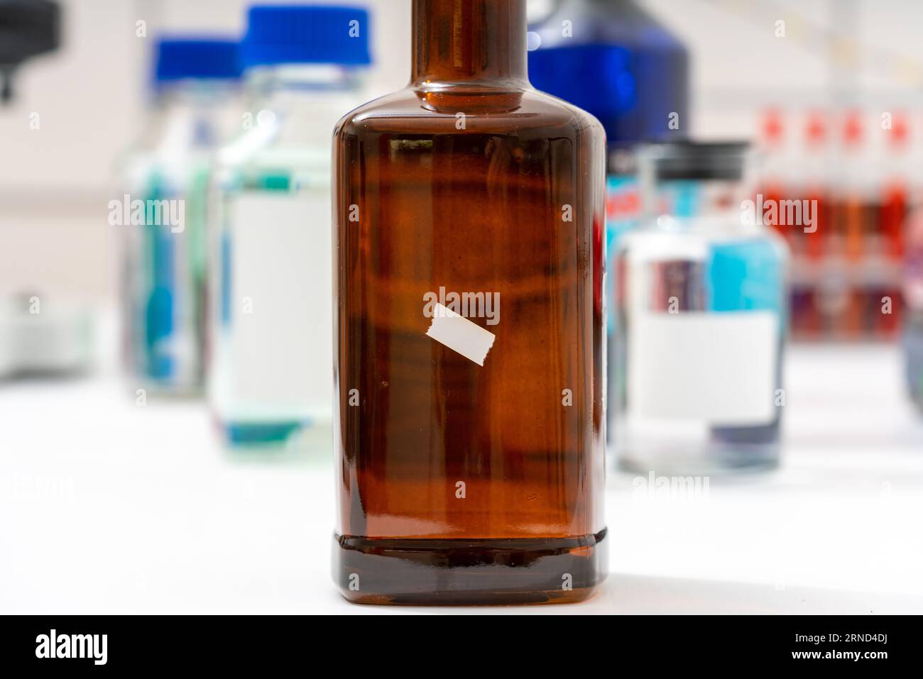 glass bottle with chemicals in biomedical laboratory Stock Photo - Alamy