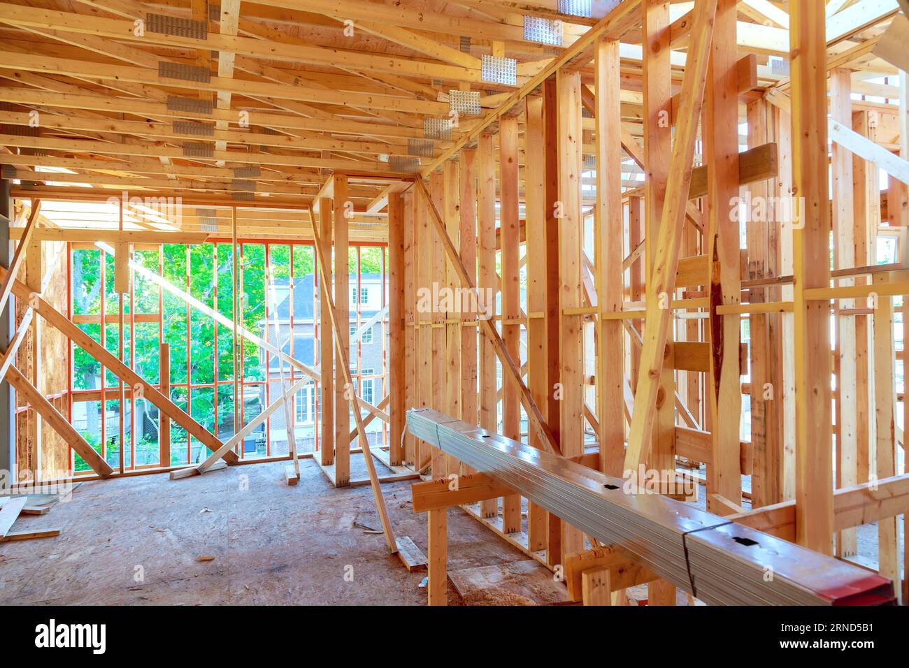 Structural framework interior view of new unfinished house with wooden ...