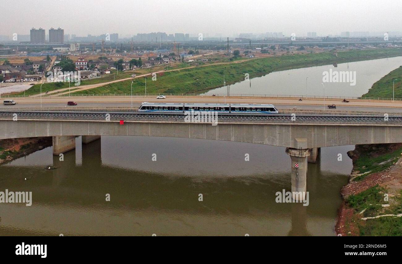 (160506) -- CHANGSHA, May 6, 2016 -- A train runs on the magnetic ...