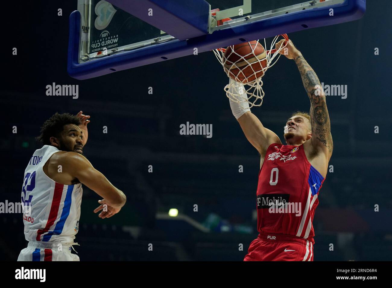 Puerto Rico forward Isaiah Pineiro (0) dunks the ball against Dominican ...