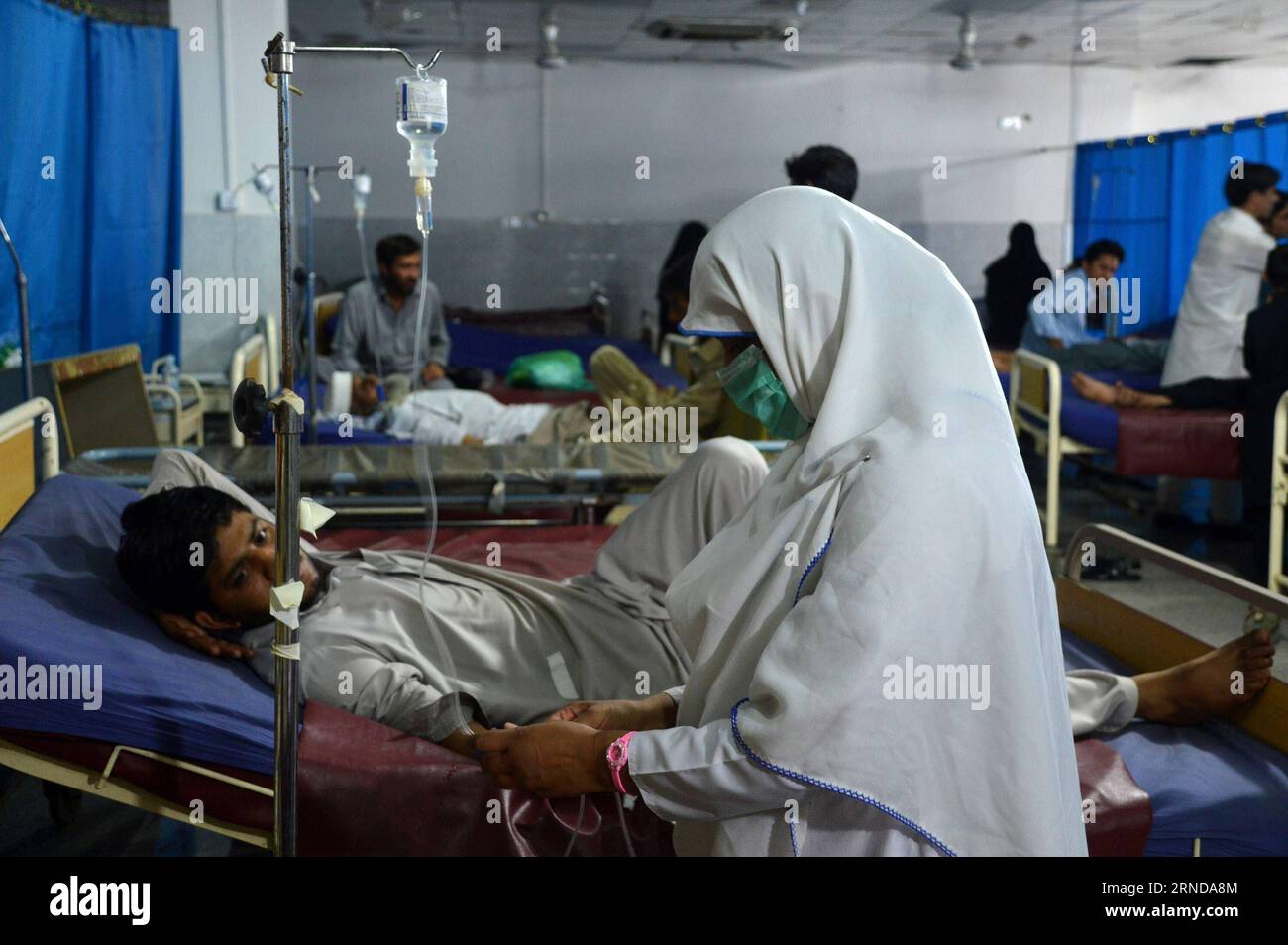 (160512) -- PESHAWAR, May 12, 2016 -- A Pakistani nurse takes care of a ...