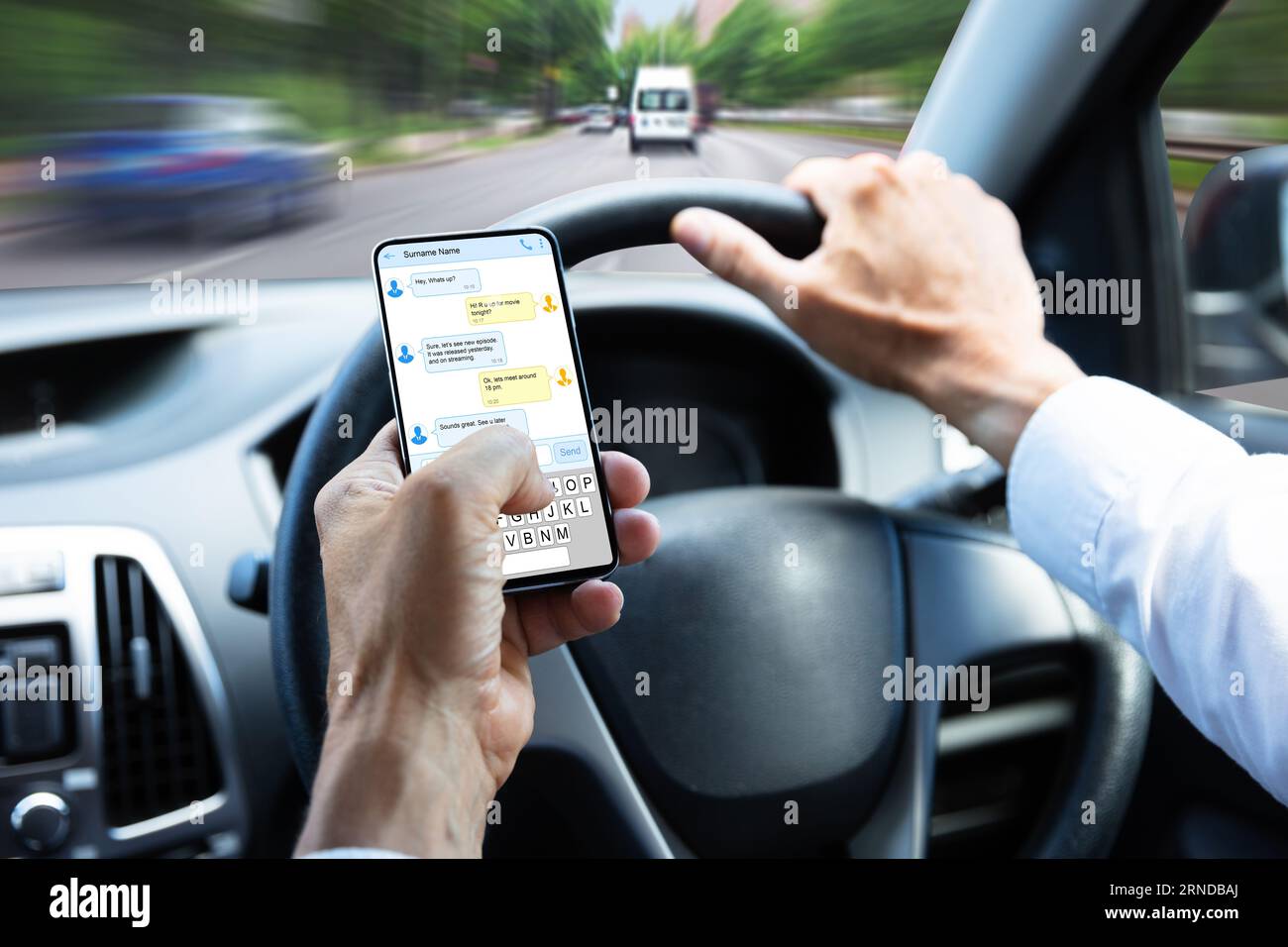 Close-up Of A Man's Hand Typing Text Message On Mobile Phone While ...