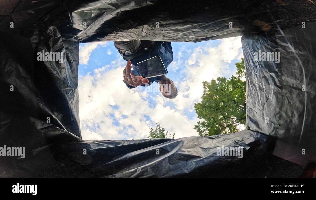 Man Throwing Away Smartphone. Old Technology Garbage Stock Photo - Alamy