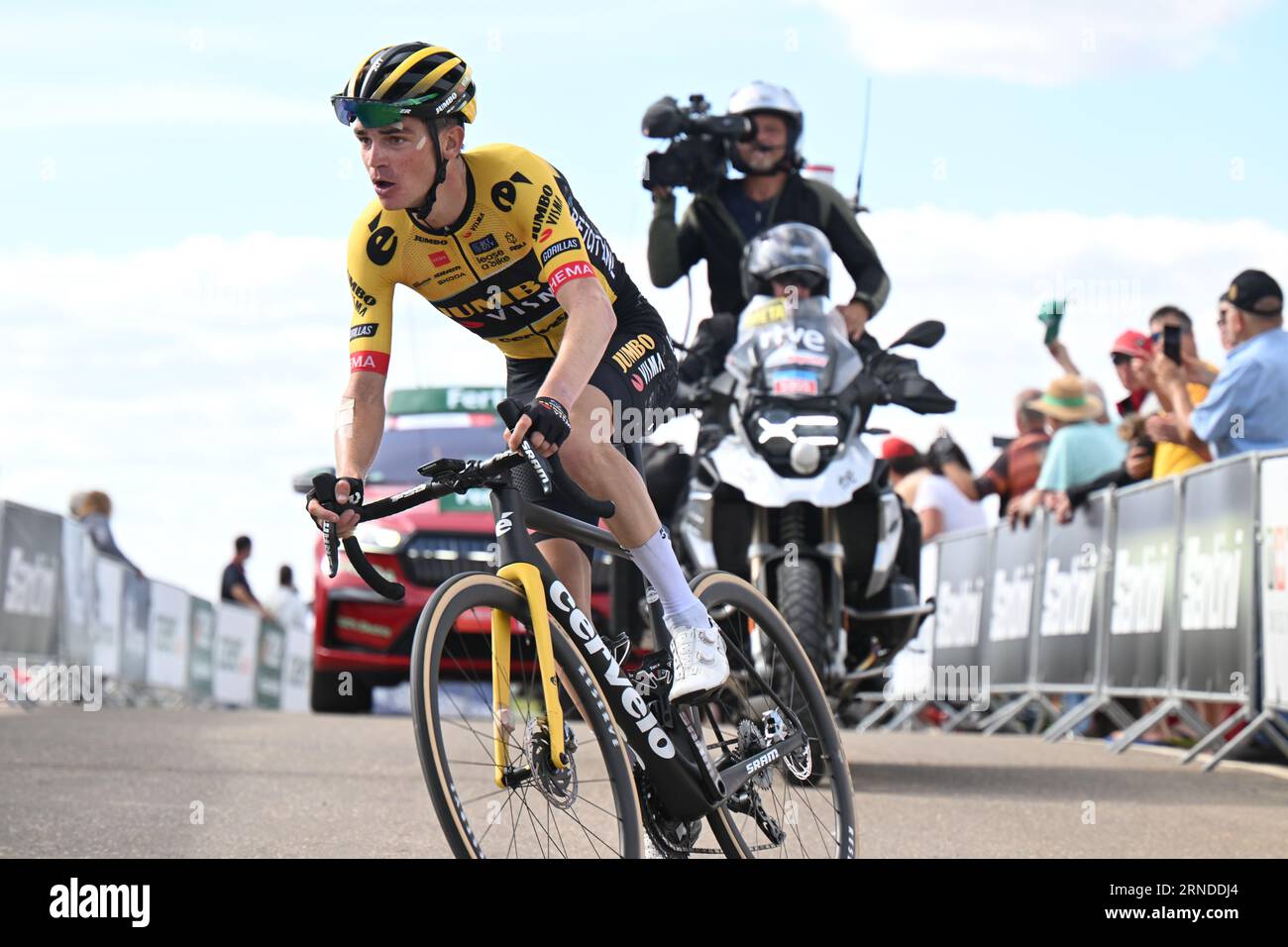 Sepp Kuss USA JUmbo Visma on the climb heading towards a famous win and ...