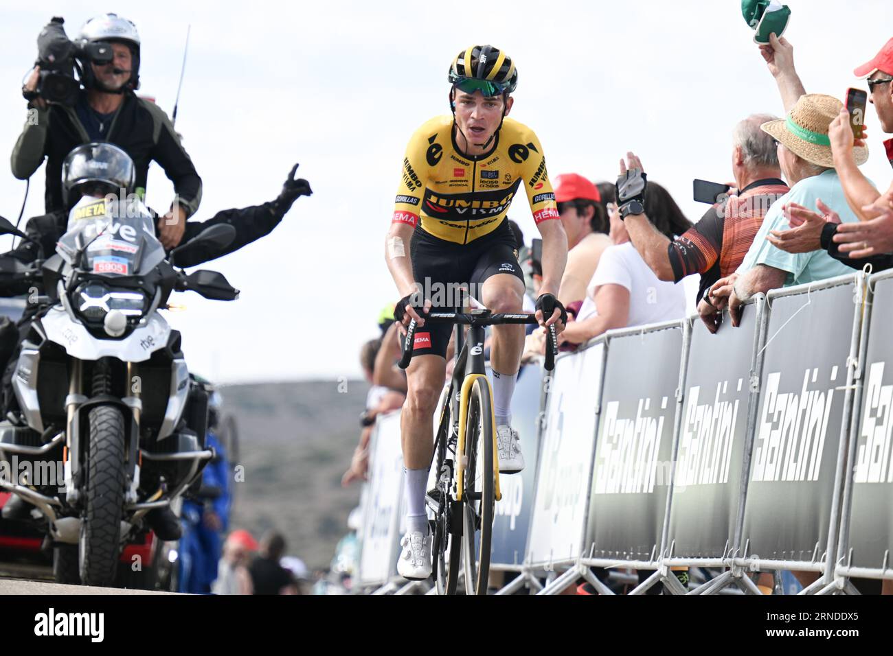 Sepp Kuss USA JUmbo Visma on the climb heading towards a famous win and ...