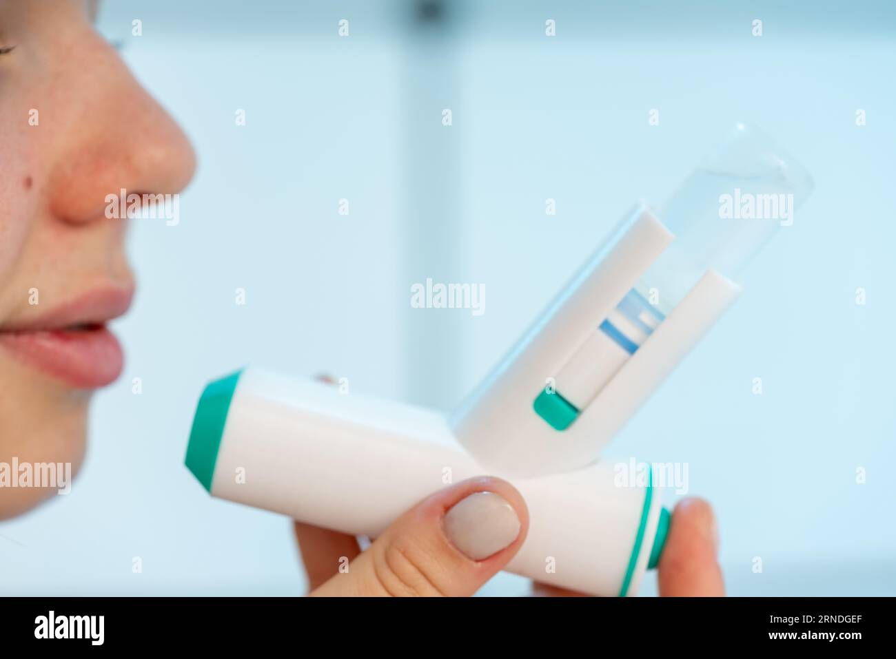 girl uses a medical inhaler with medicine Stock Photo - Alamy