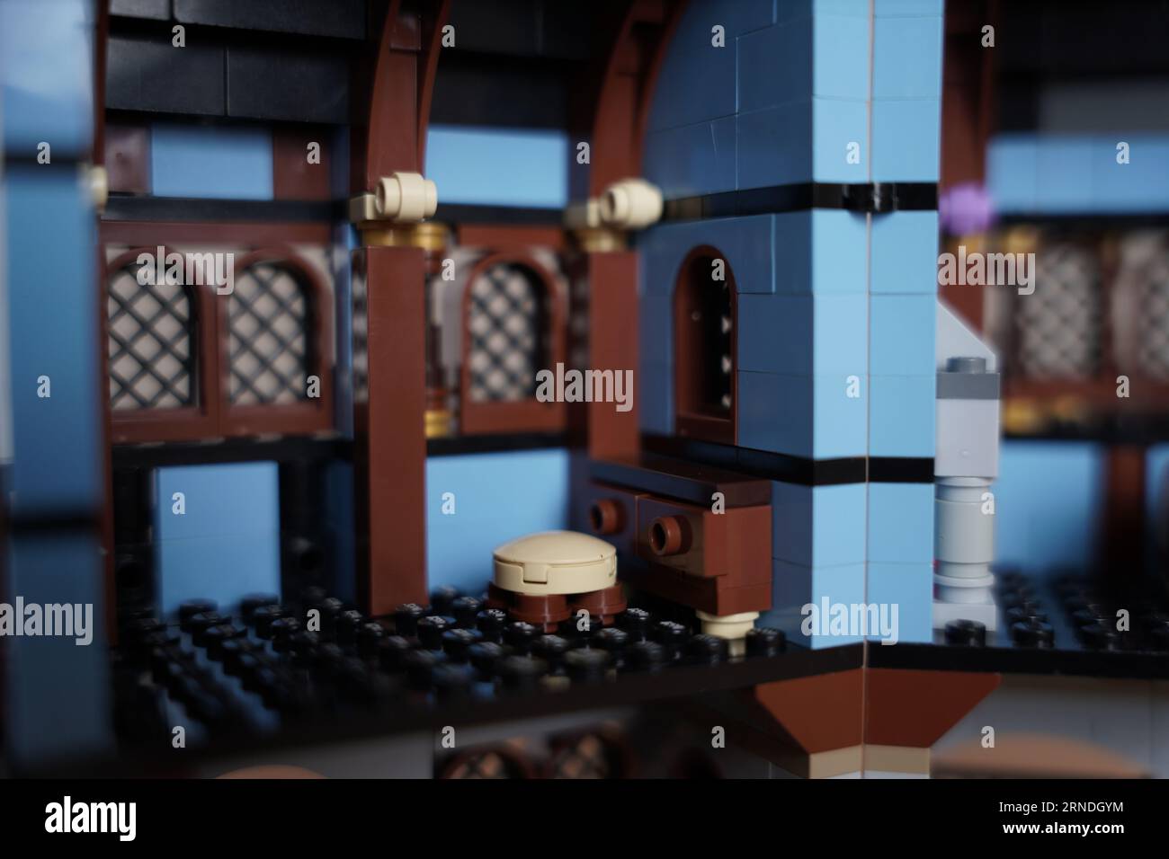 lego medieval market village 1601, A person is building a lego house ...