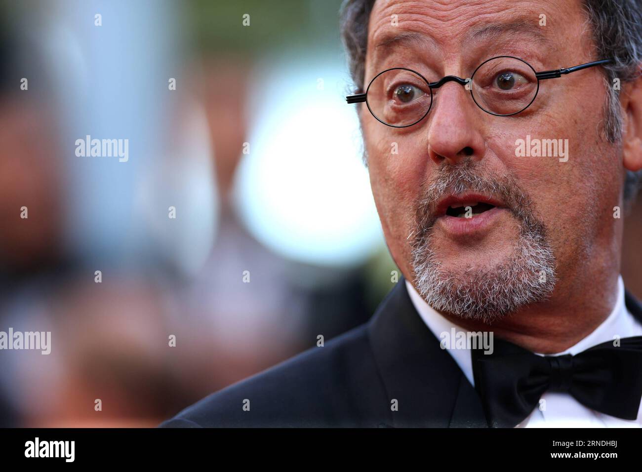 Cast member Jean Reno poses on the red carpet as he arrives for the ...