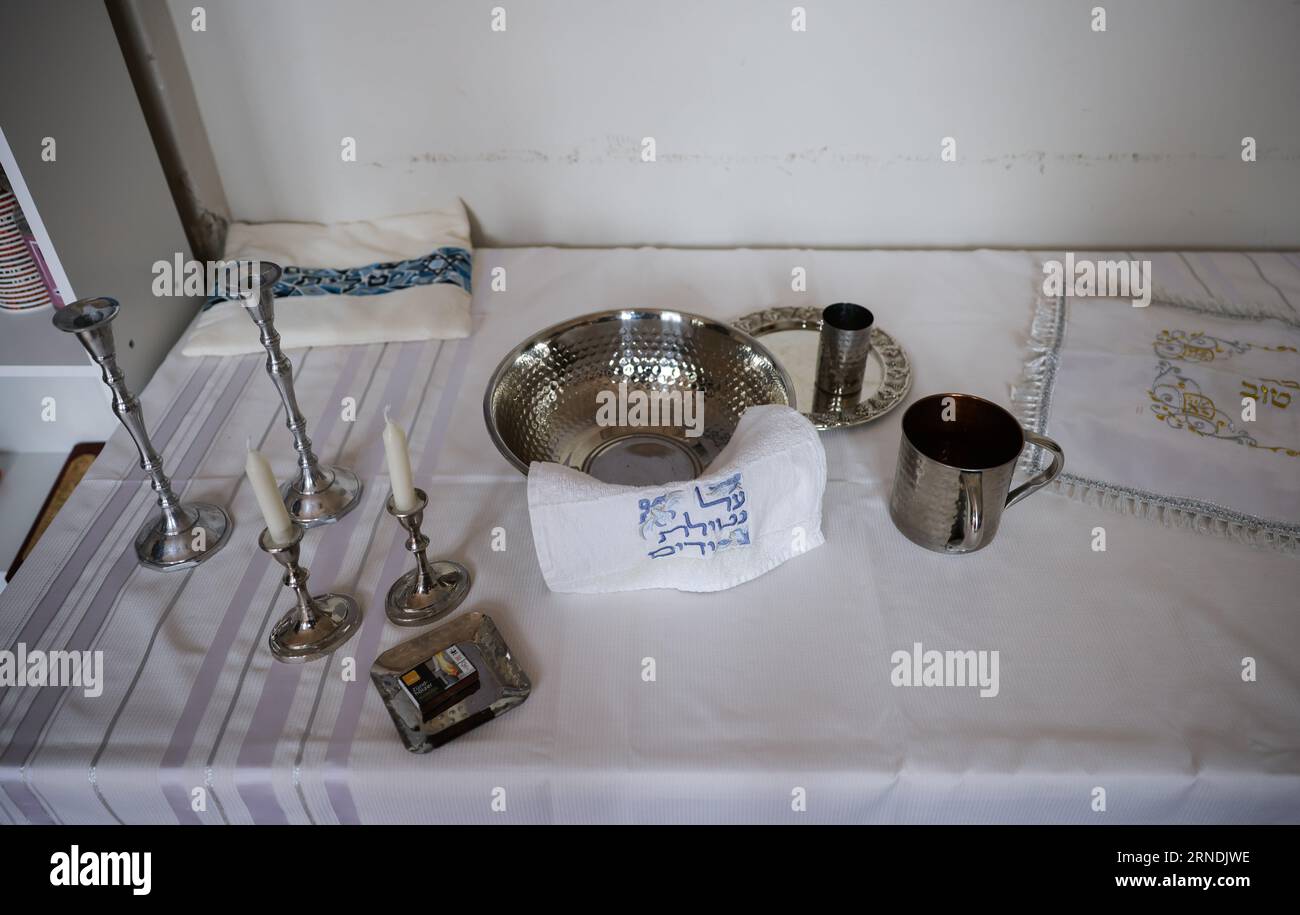 Hamburg, Germany. 01st Sep, 2023. Bowls, candles and cups stand on a ...