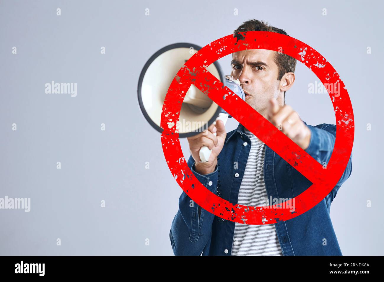 Megaphone, stop or angry man shouting in studio on white background for ...