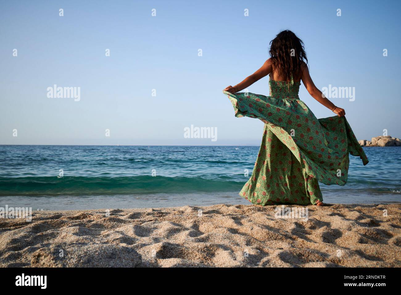 Wind blowing dress hi-res stock photography and images - Alamy