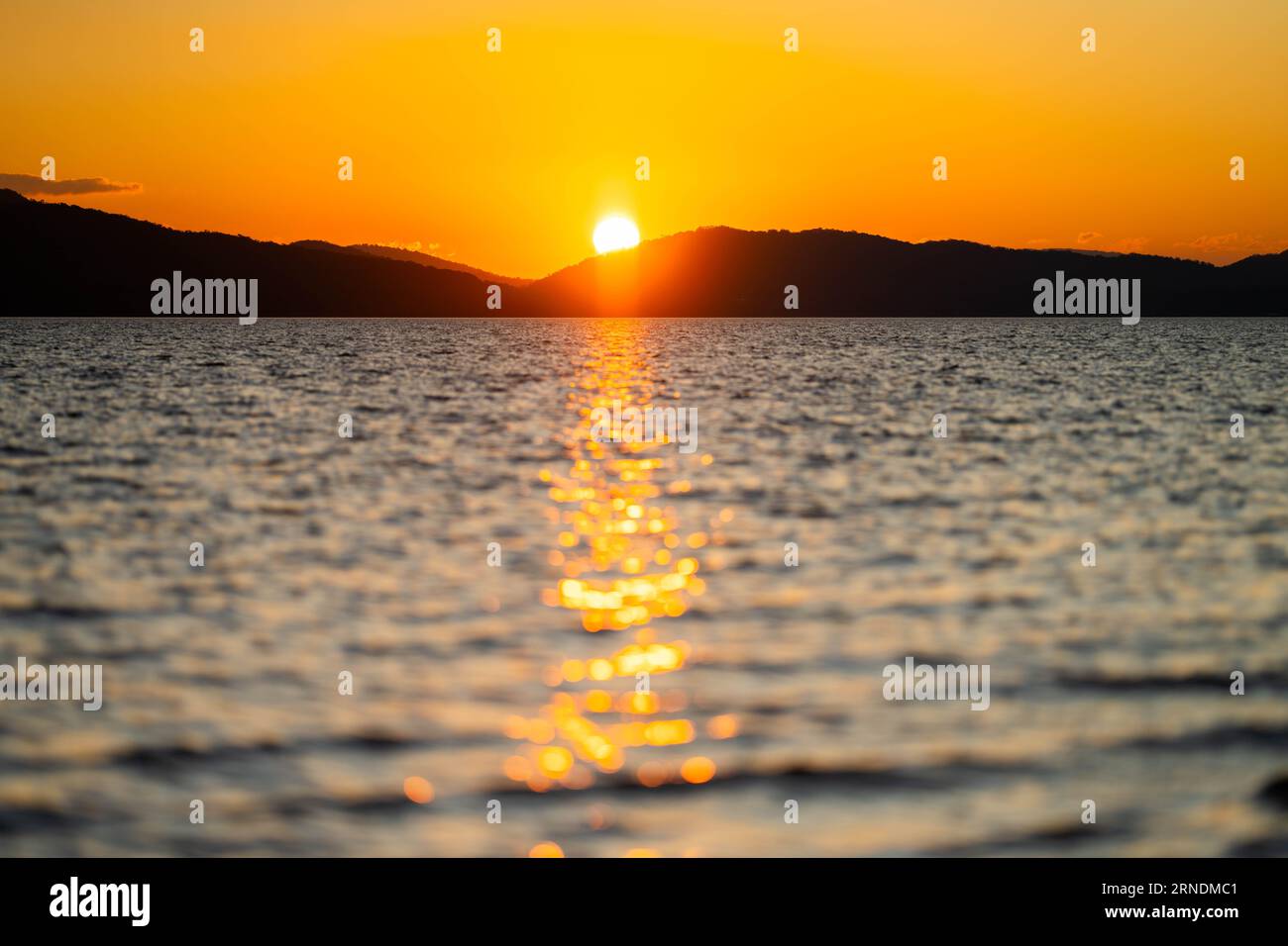 red sunrise over islands and the ocean in australia Stock Photo - Alamy