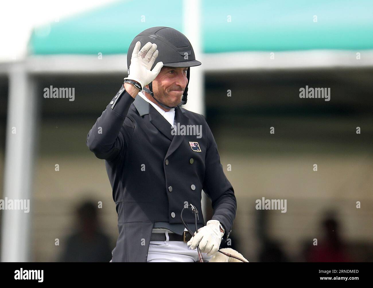 Tim Price celebrates on Vitali during in the Dressage on day two of the ...