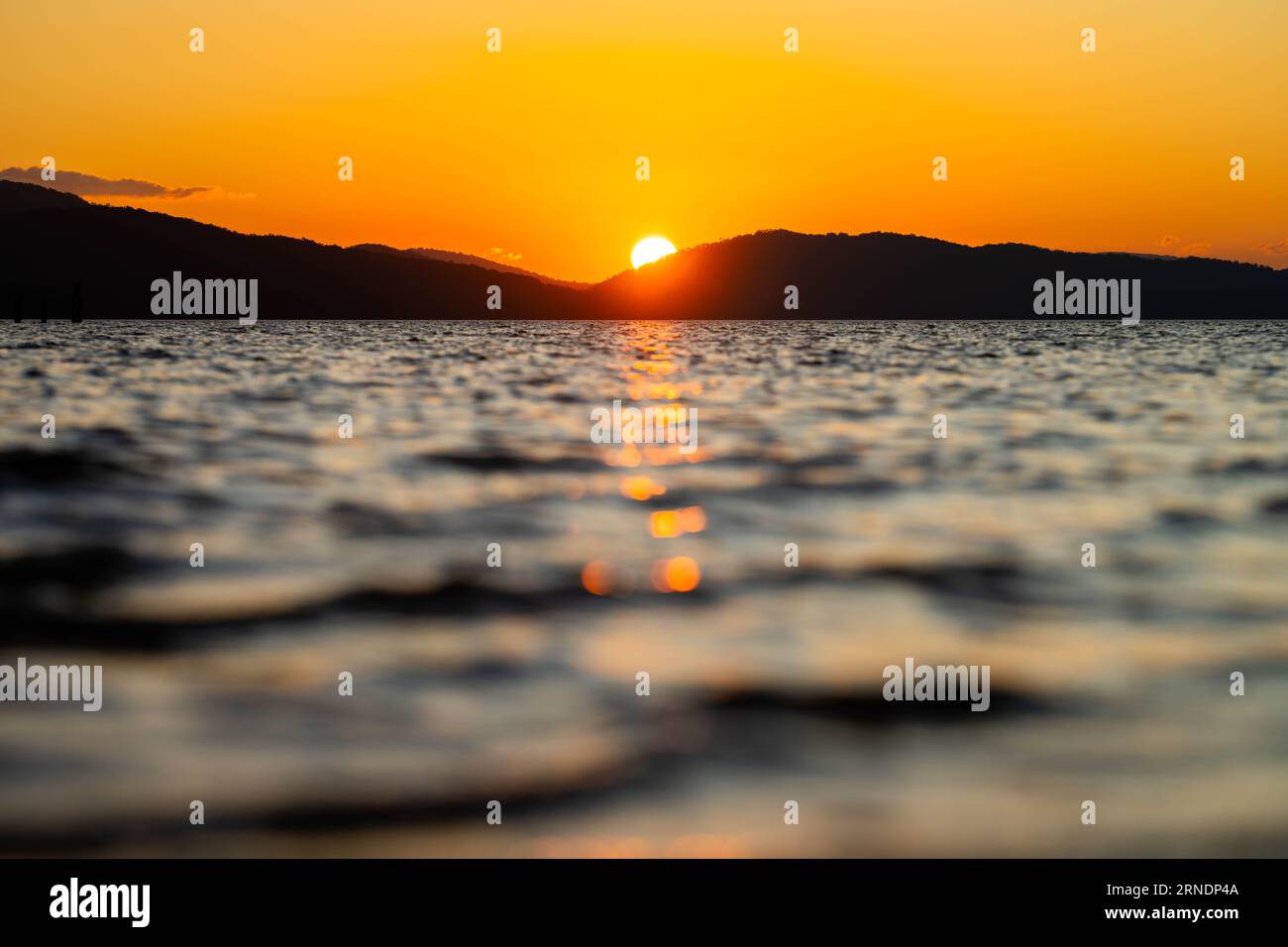 red sunrise over islands and the ocean in australia Stock Photo - Alamy