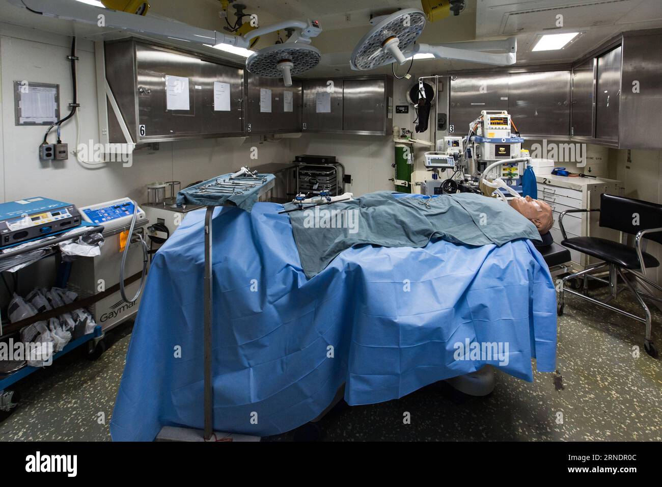 A dummy is pictured inside one of the operation rooms on board the USS ...