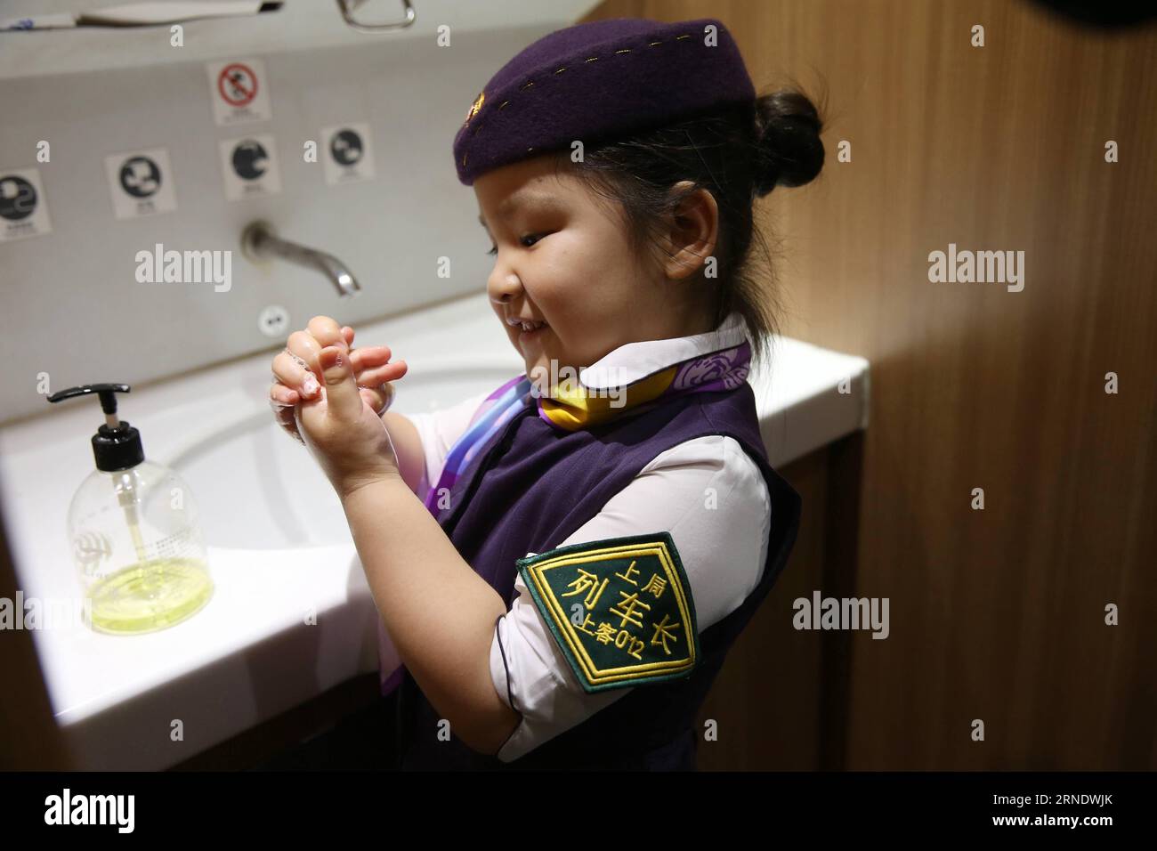 SHANGHAI, May 31, 2016 -- Xia Xinyu, 4, washes her hands as ...