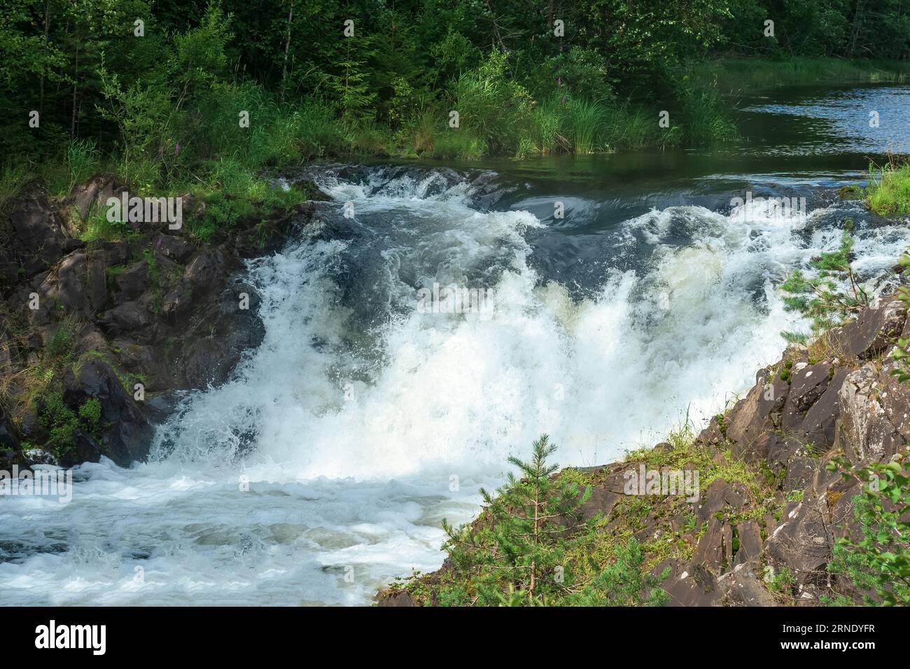 natural landscape with a small waterfall with clear water Stock Photo ...