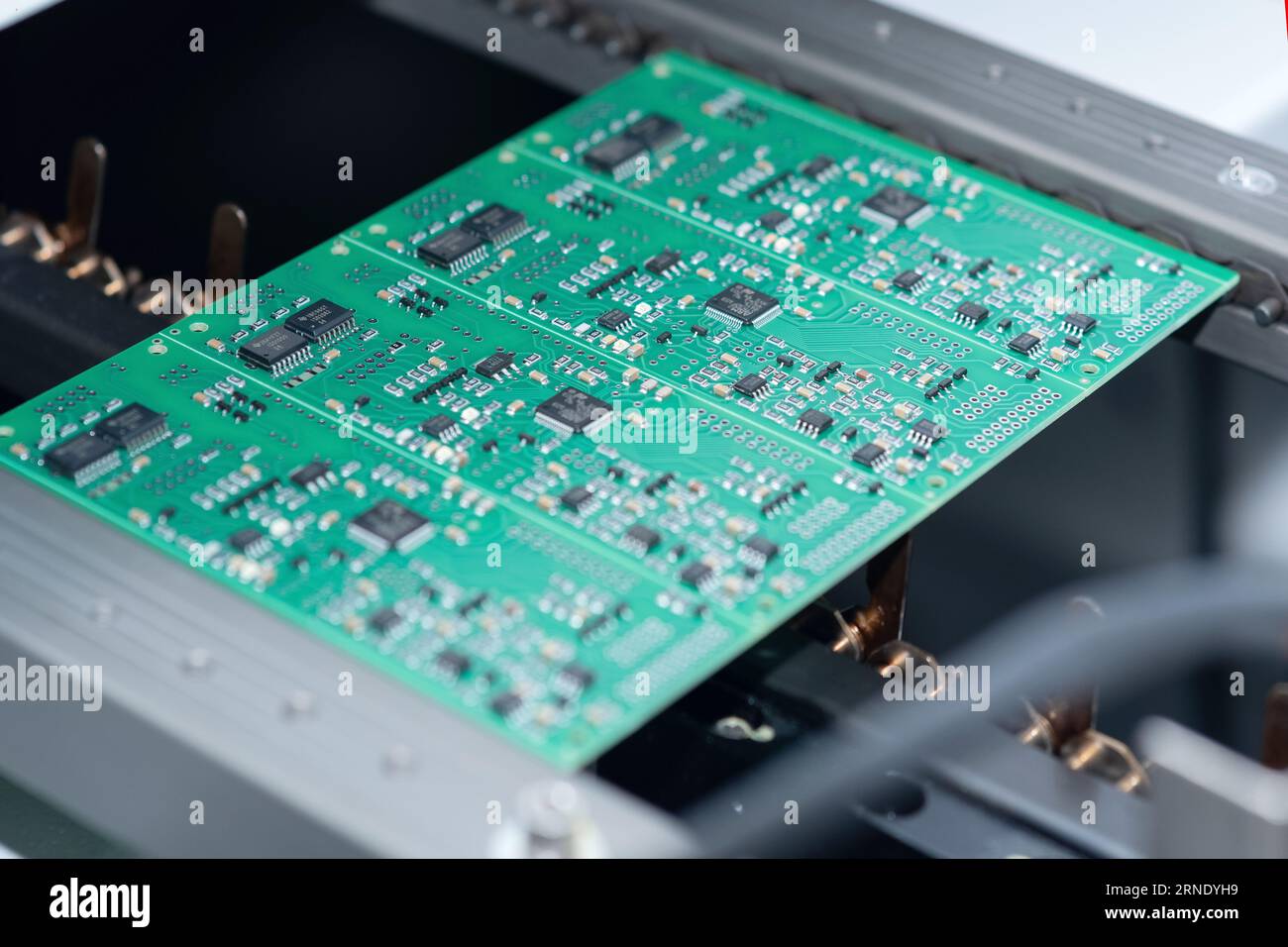 Perm, Russia - June 29, 2023: stage of PCB production on the conveyor ...