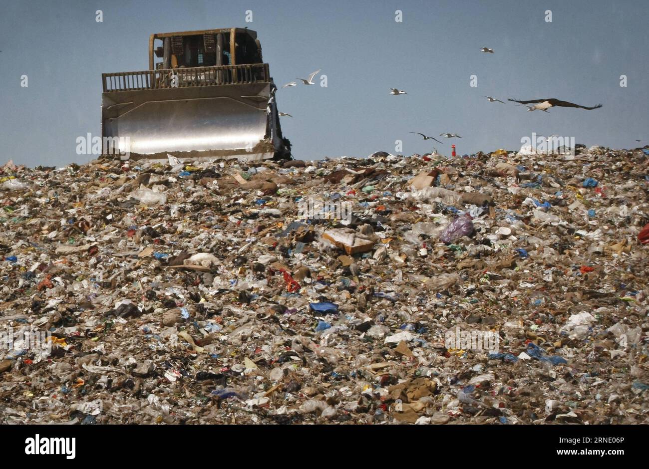 A compactor works on a landfill site during a bus tour of the Vancouver ...