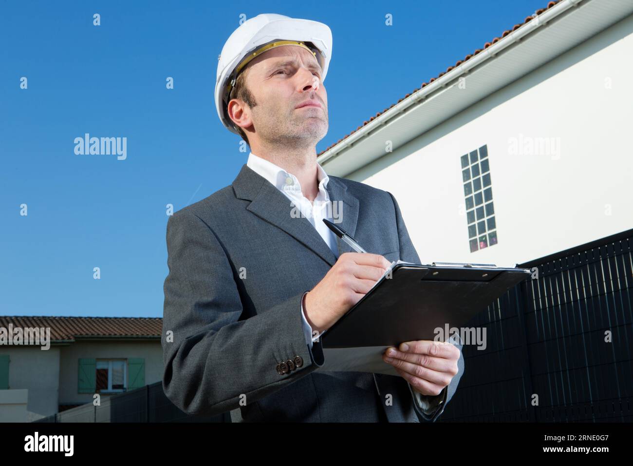building surveyor at site Stock Photo - Alamy