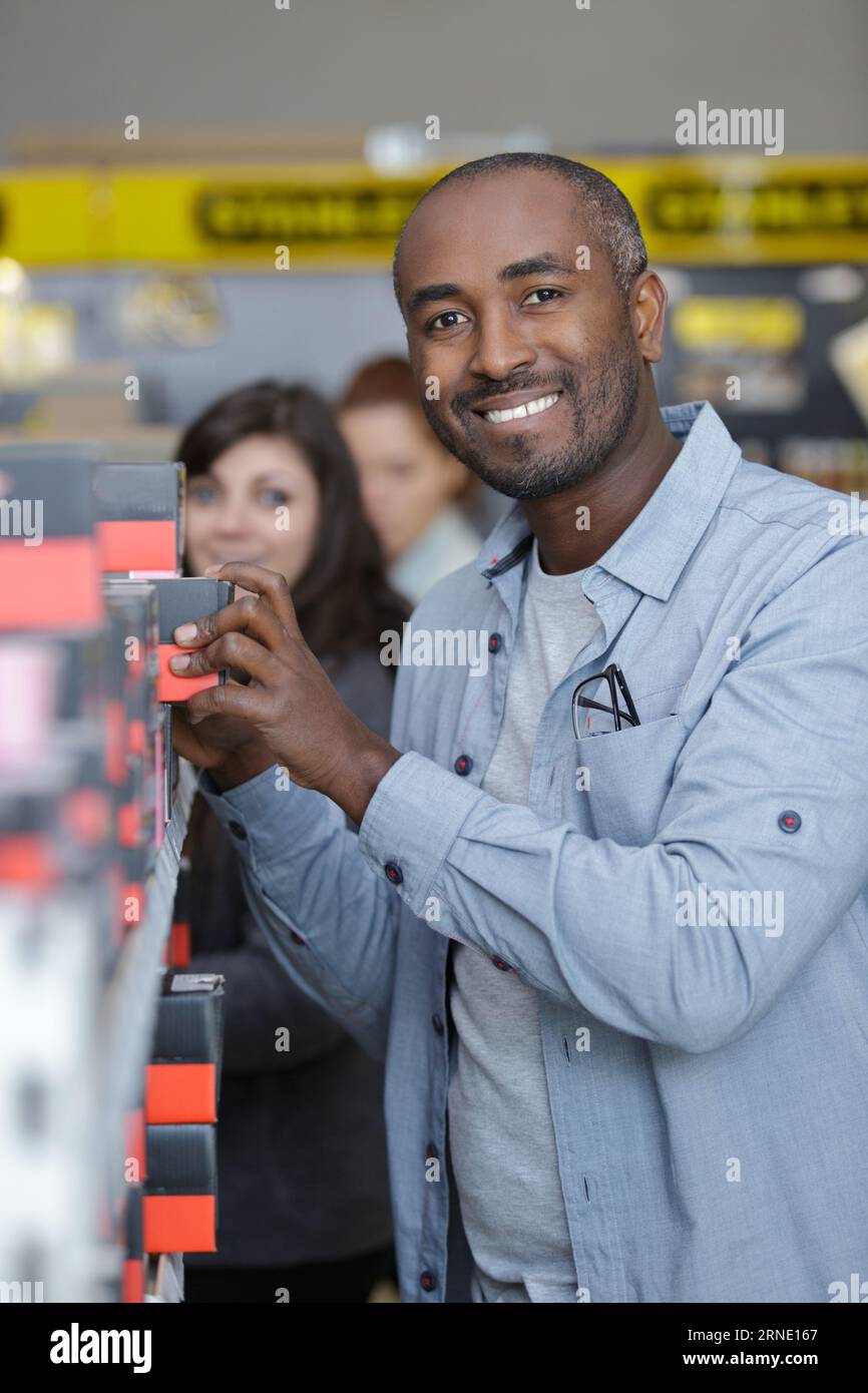 customer in a tool or hardware store Stock Photo - Alamy