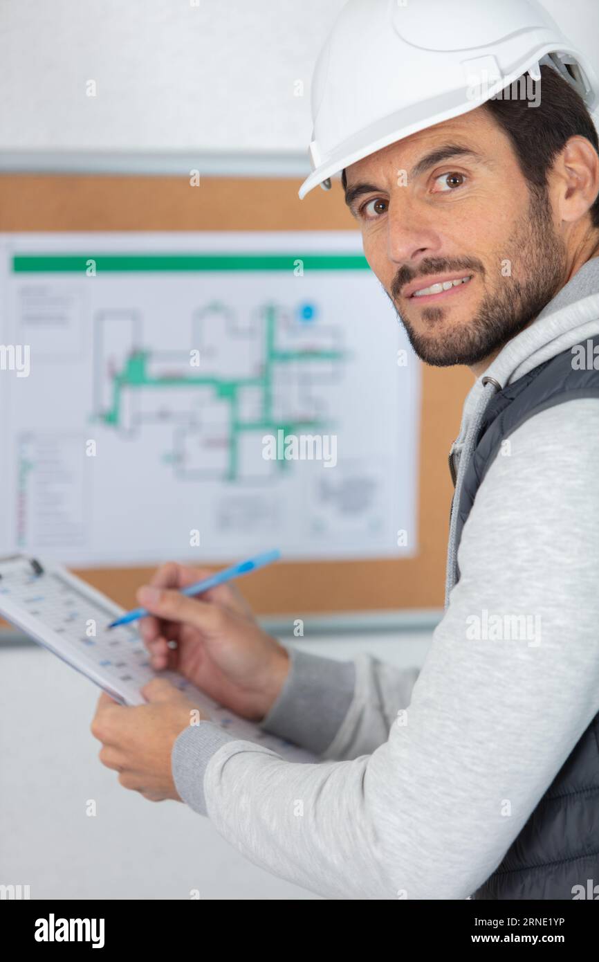 inspector checking and inspecting the building Stock Photo - Alamy