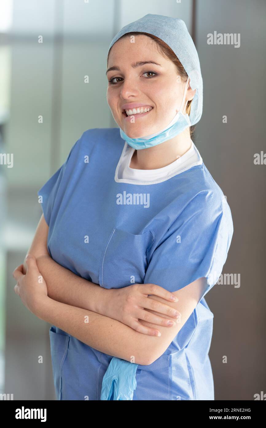 young woman as a surgeon in blue surgical clothing Stock Photo - Alamy
