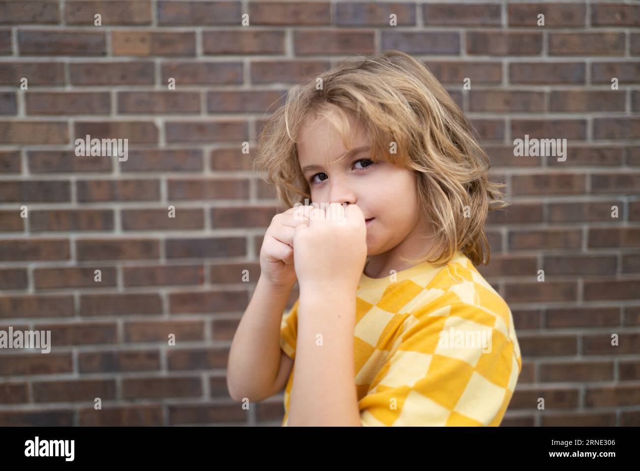 Child temper with angry expression. Angry hateful little rage boy ...