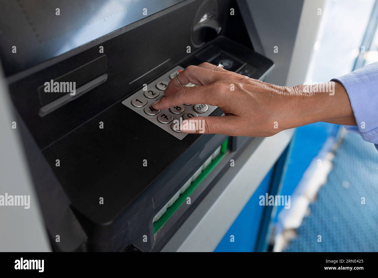 Hand typing pin code hi-res stock photography and images - Alamy