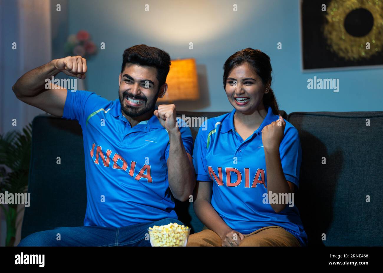 Indian couples celebrating indias win while watching live cricket ...