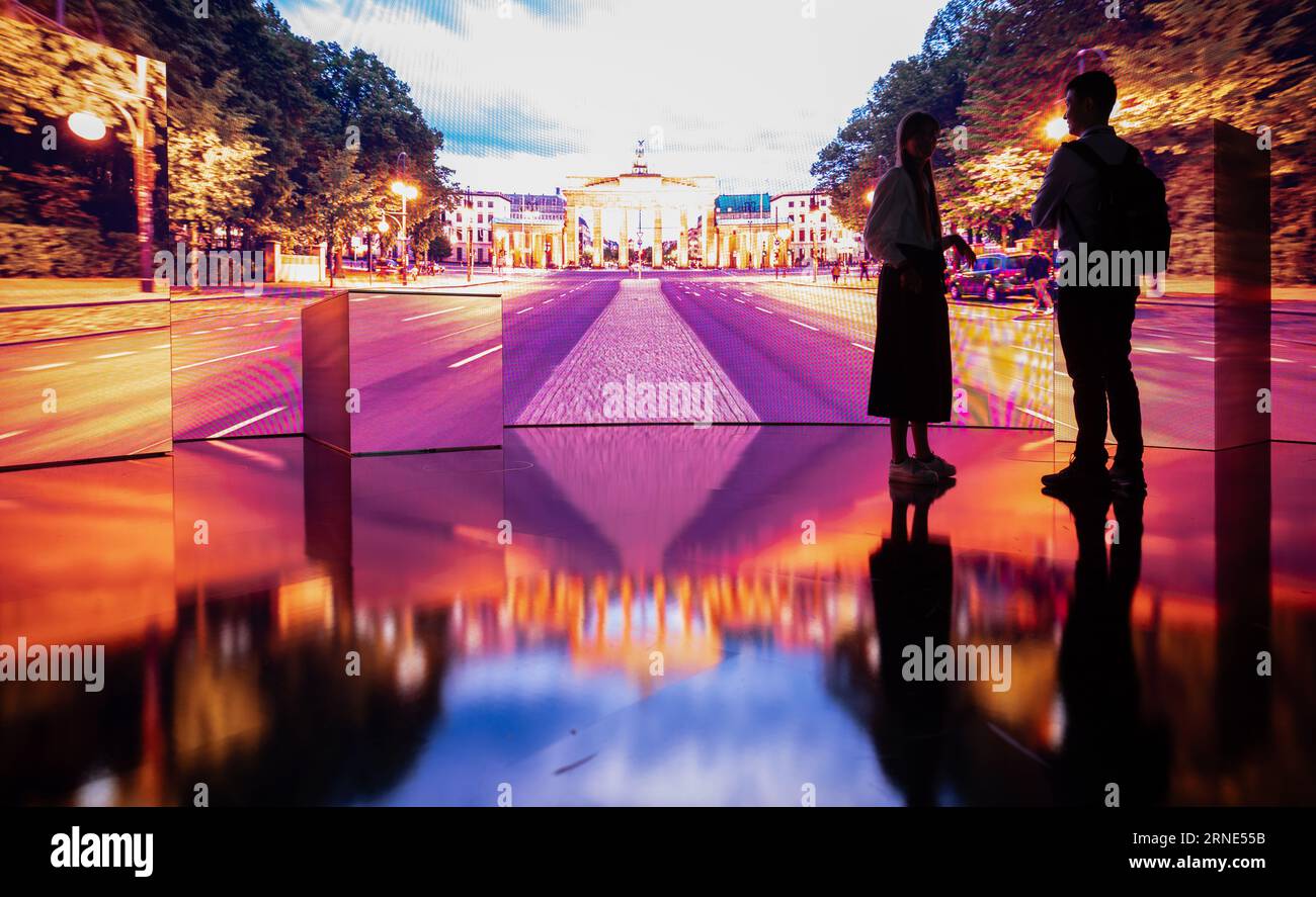 Berlin, Germany. 01st Sep, 2023. Visitors walk through a video ...